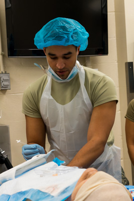 Medics practice immediate care procedures on cadavers, learning to save ...